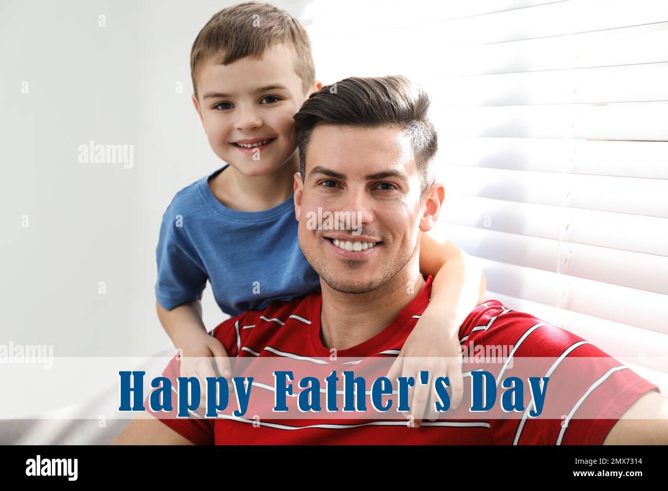 Dad and son spending time together at home. Happy Father's Day Stock ...