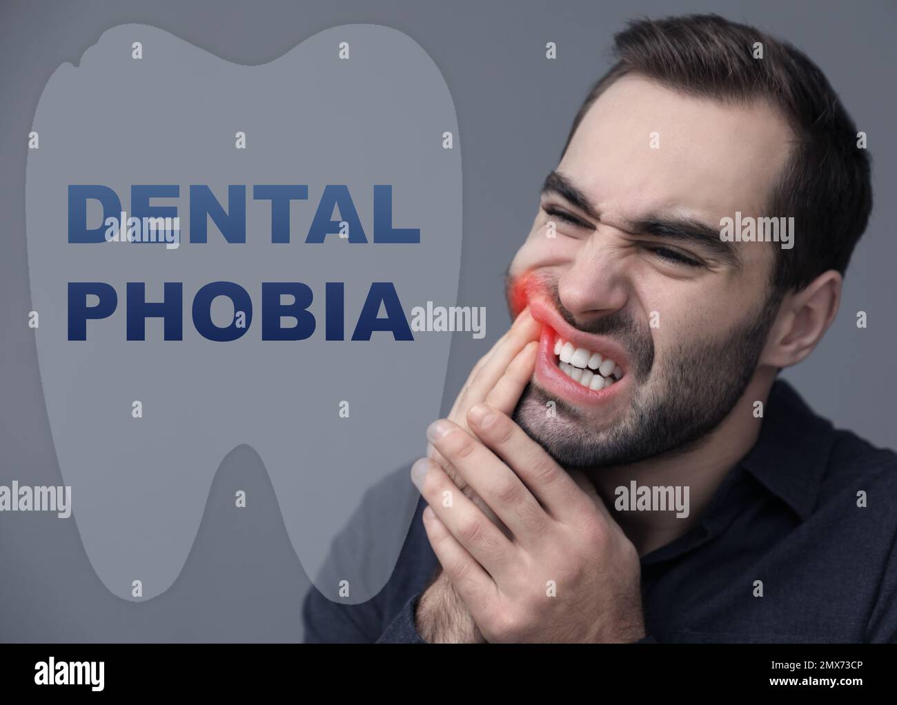 Dental phobia concept. Young man suffering from toothache on grey ...