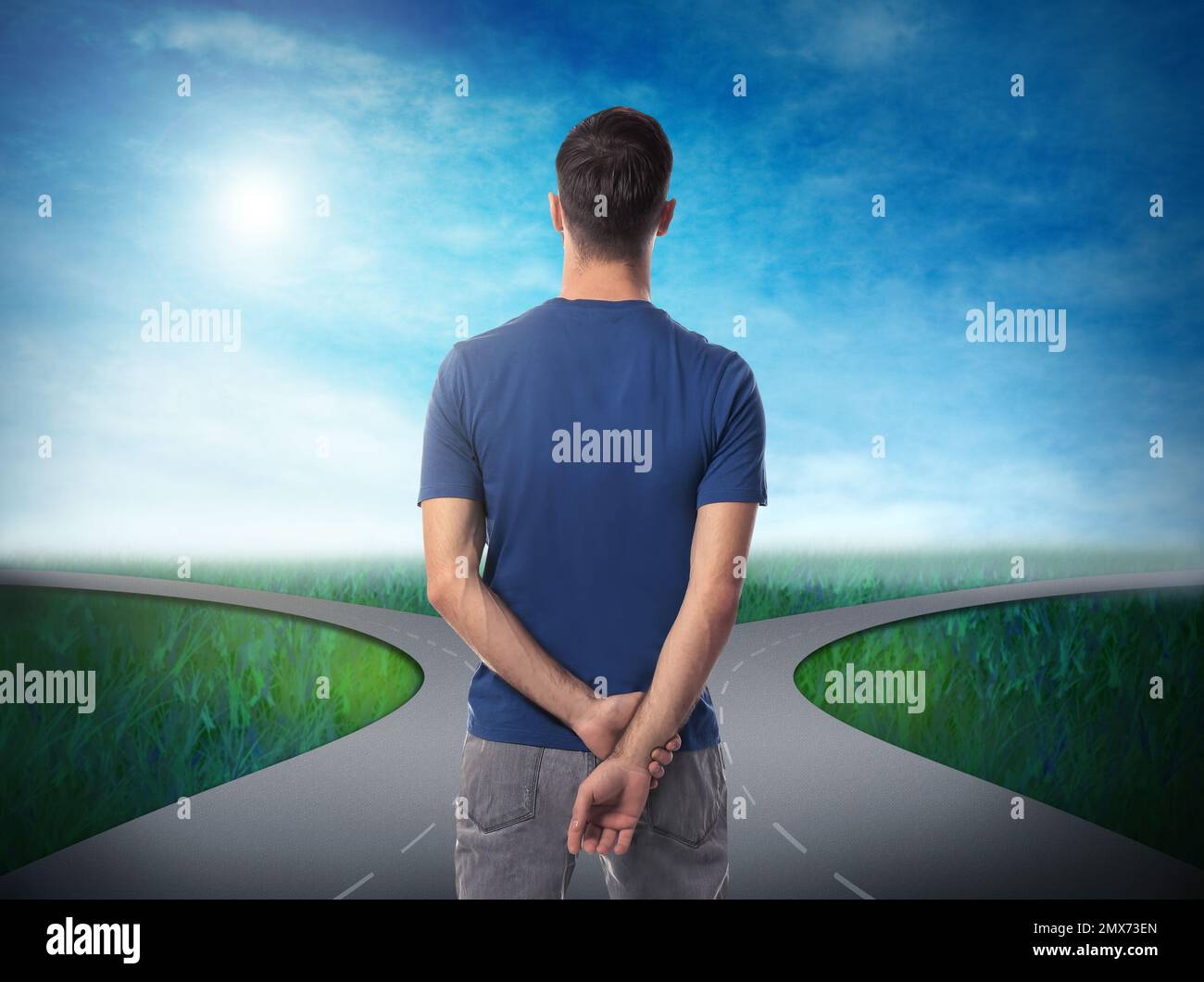 Choose your way. Man standing at crossroads taking important decision ...