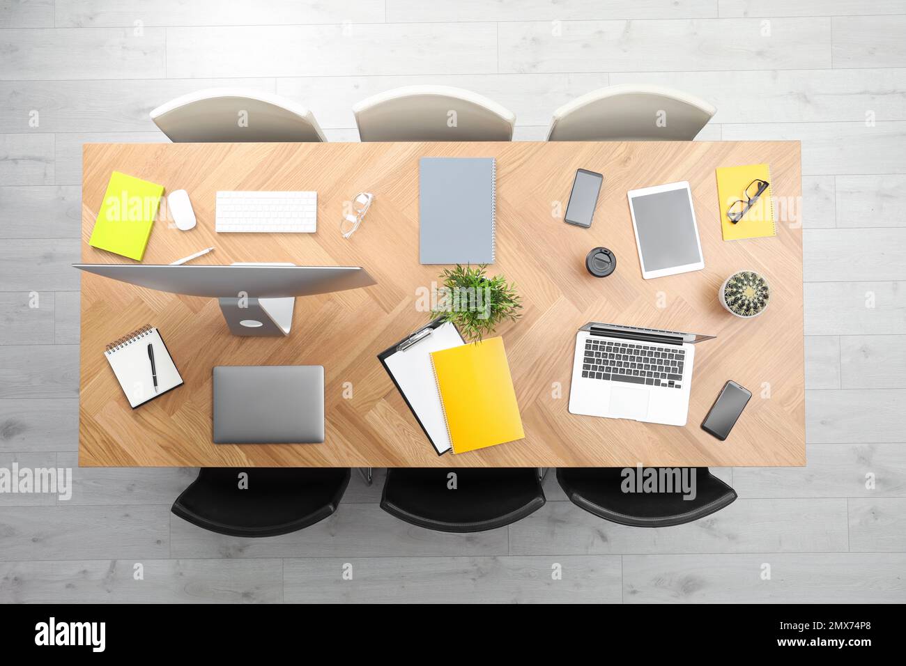 Modern office table with devices and chairs, top view Stock Photo - Alamy