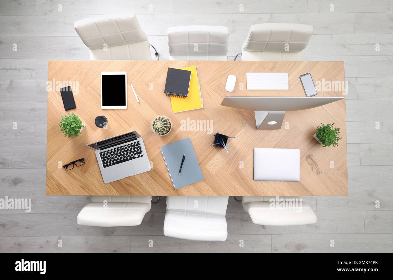Modern office table with devices and chairs, top view Stock Photo - Alamy