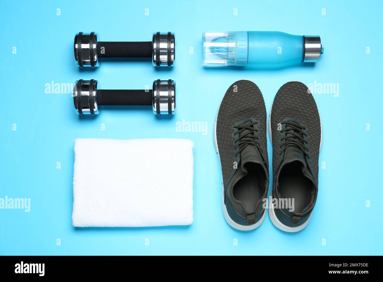 Man's sport items on light blue background, flat lay Stock Photo - Alamy
