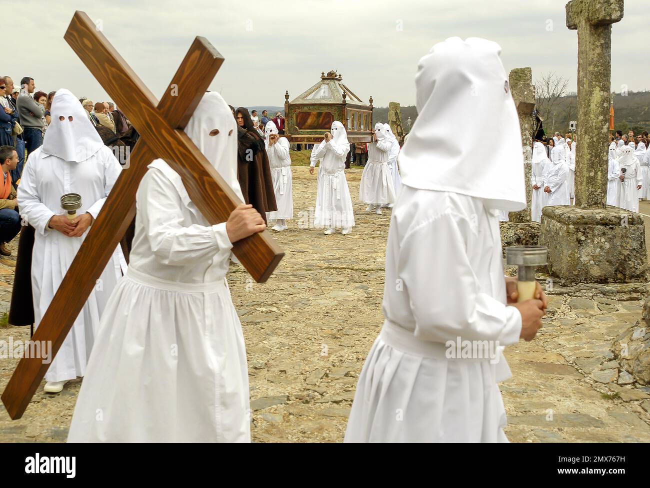 Holy Week in Zamora, Spain. Penitents carry the urn of Christ towards ...