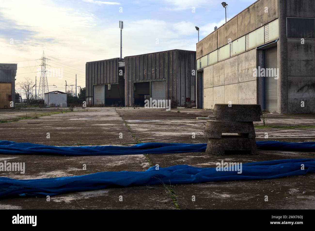Abandoned industrial compound closed by a gate in the italian ...