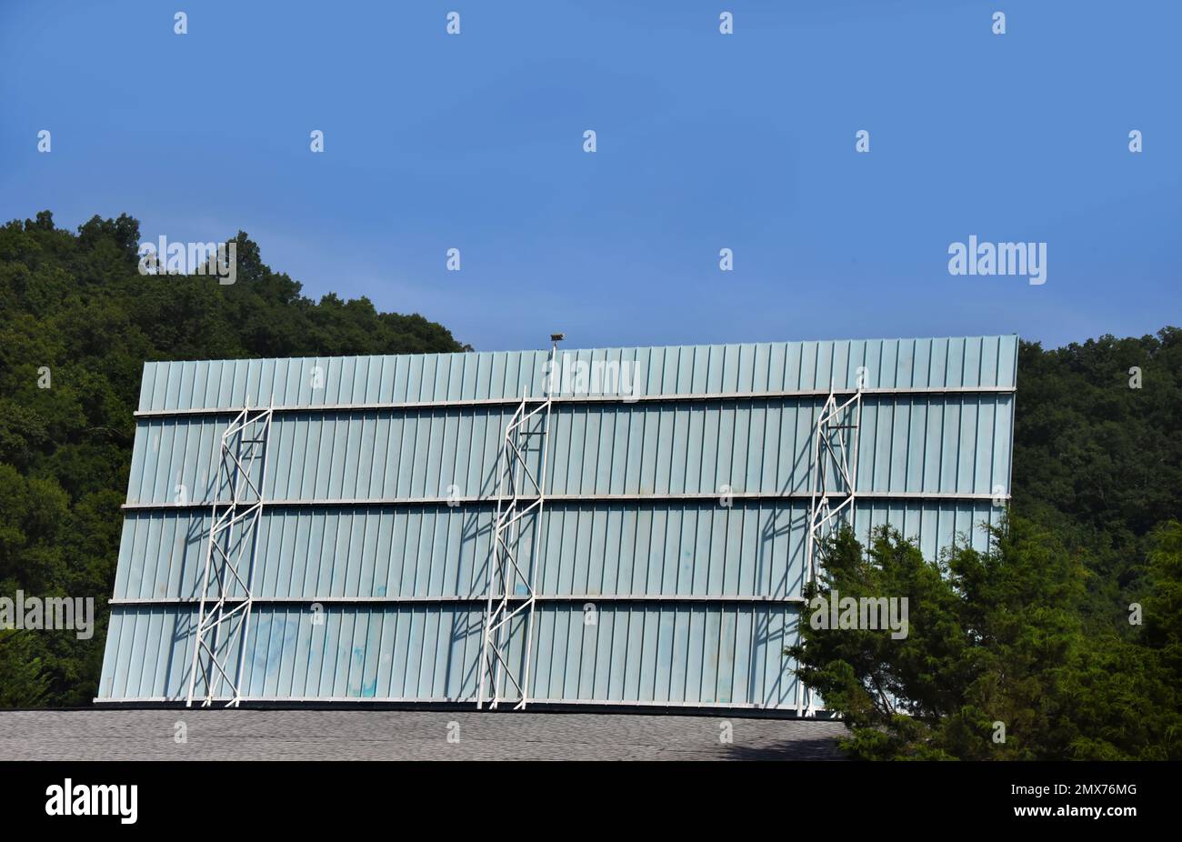 Rear view of the screen for a drive in movie. Movies are still shown ...