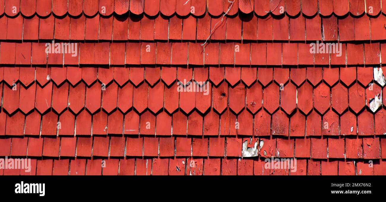 Background image shows closeup of vintage, red, wooden shingles on ...