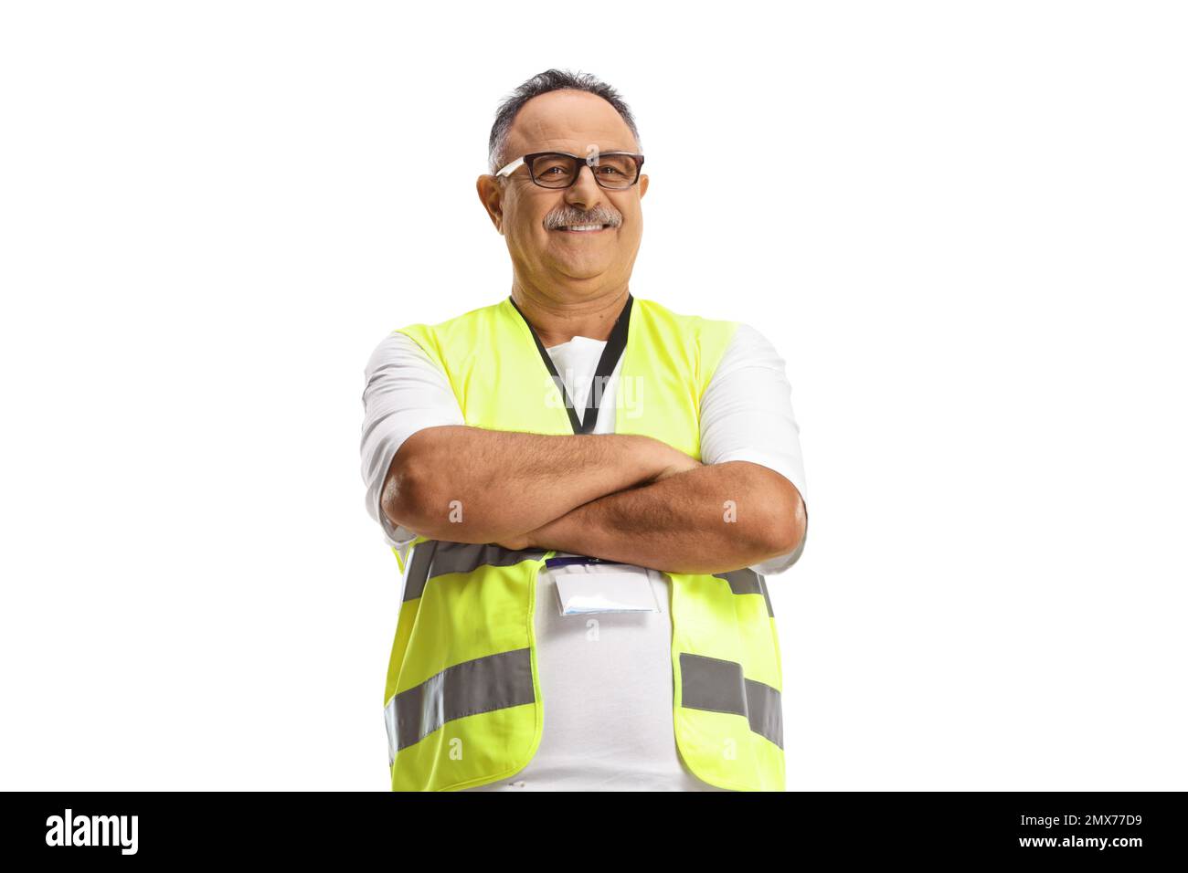 Mature man wearing a reflective vest and posing with crossed arms ...