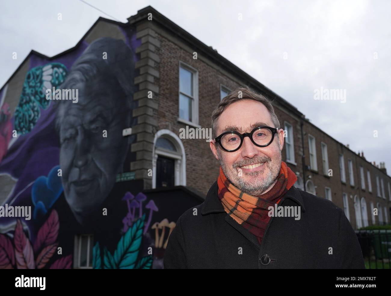 Sinn Fein's Eoin O Broin in front of a mural, on Longwood Avenue in ...