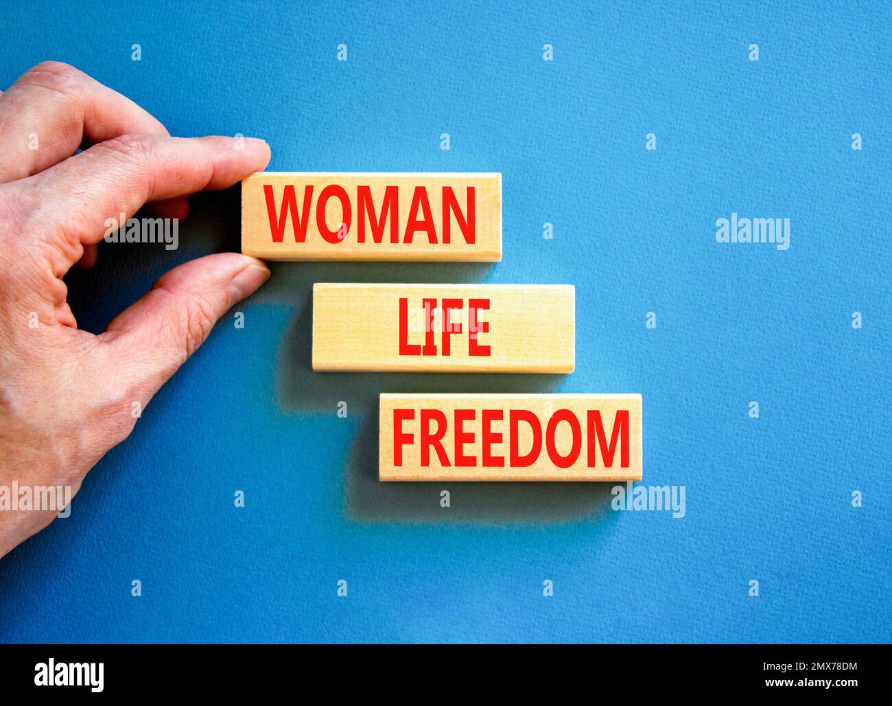 Woman life freedom symbol. Concept words Woman Life Freedom on wooden ...