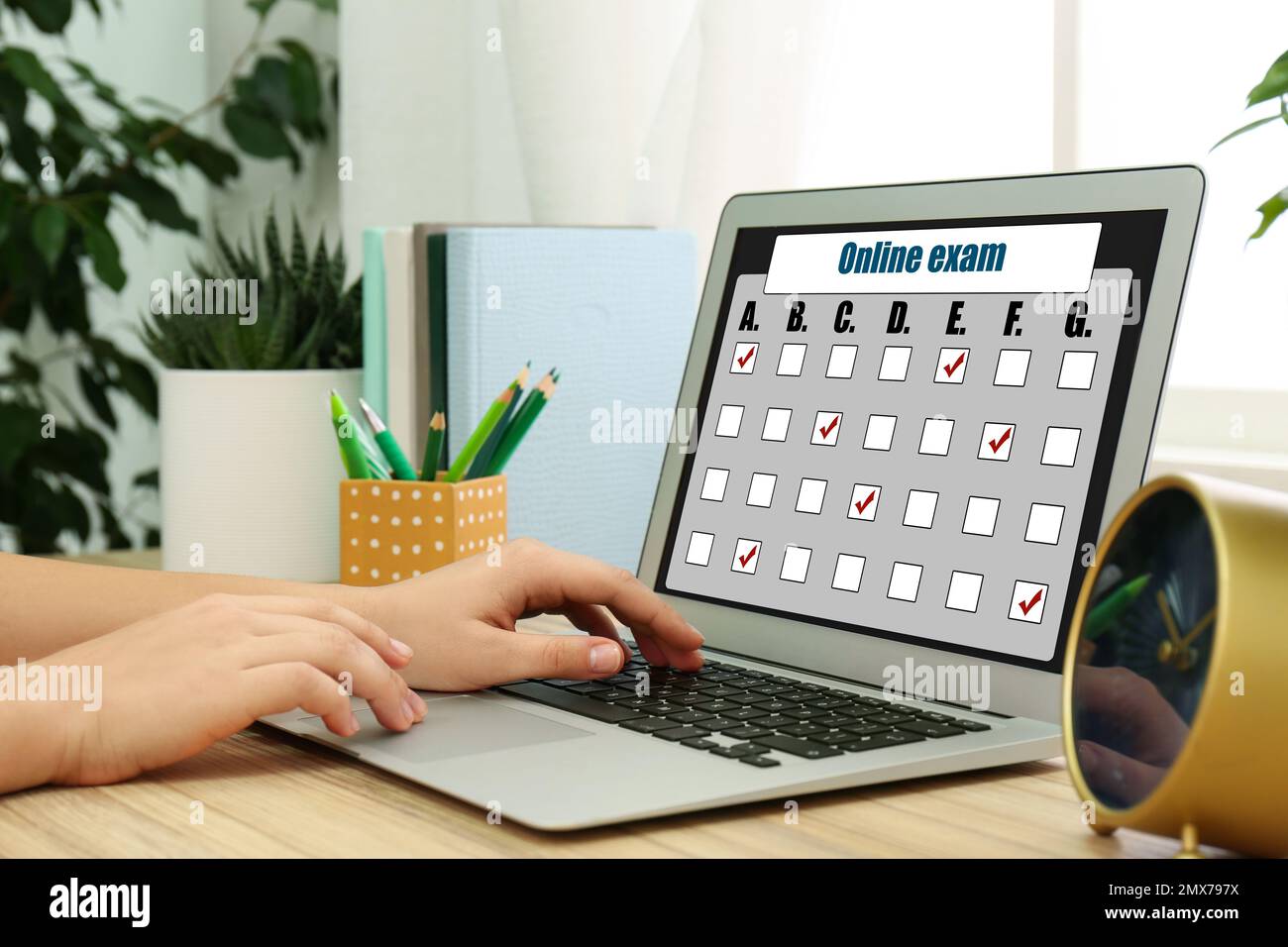 Student passing online exam at home, closeup Stock Photo - Alamy