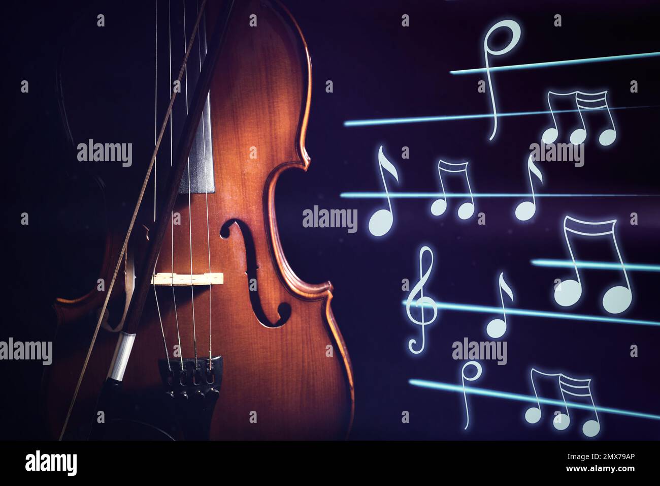Classic violin and music notes on dark background Stock Photo - Alamy