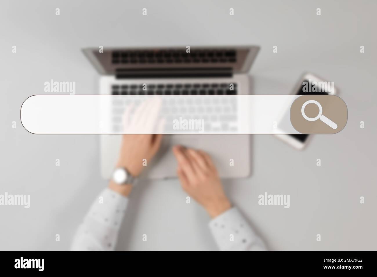 Search bar of internet browser and woman using modern laptop at table ...