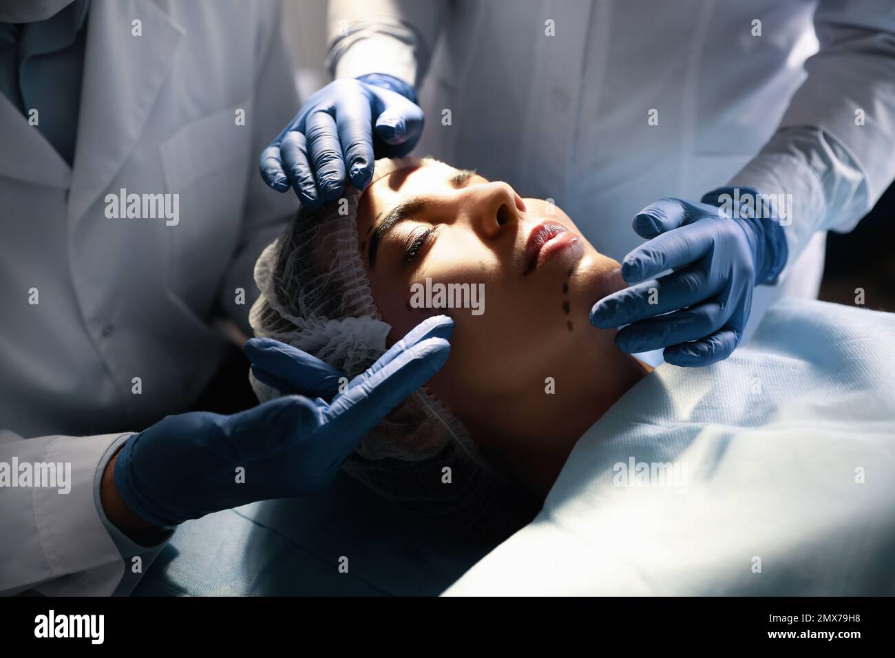 Doctor nurse preparing patient procedure hi-res stock photography and ...