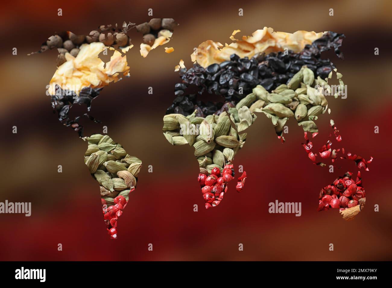 Double exposure of world map and different spices on blurred background ...