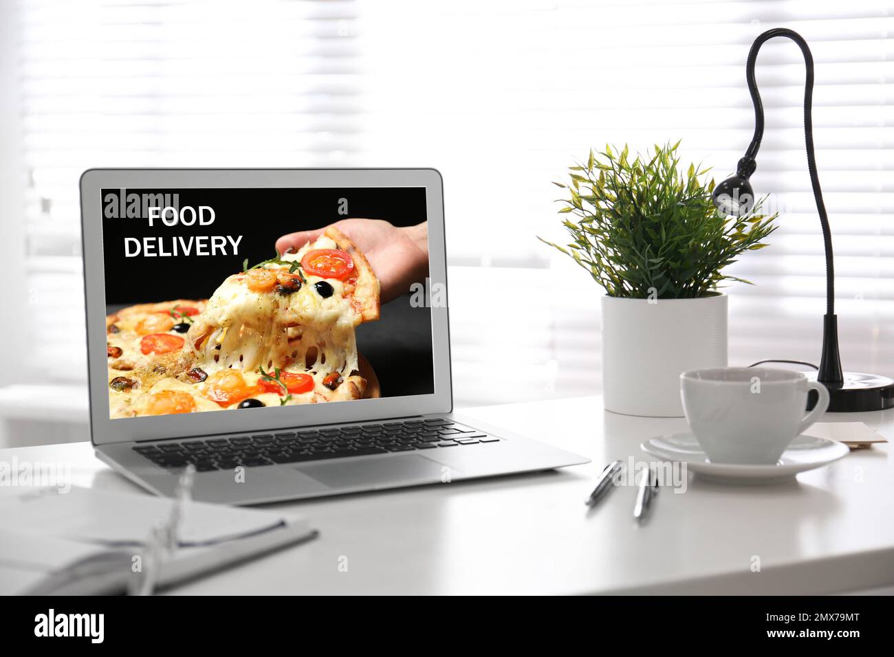 Modern laptop with open page of food delivery service on screen Stock ...