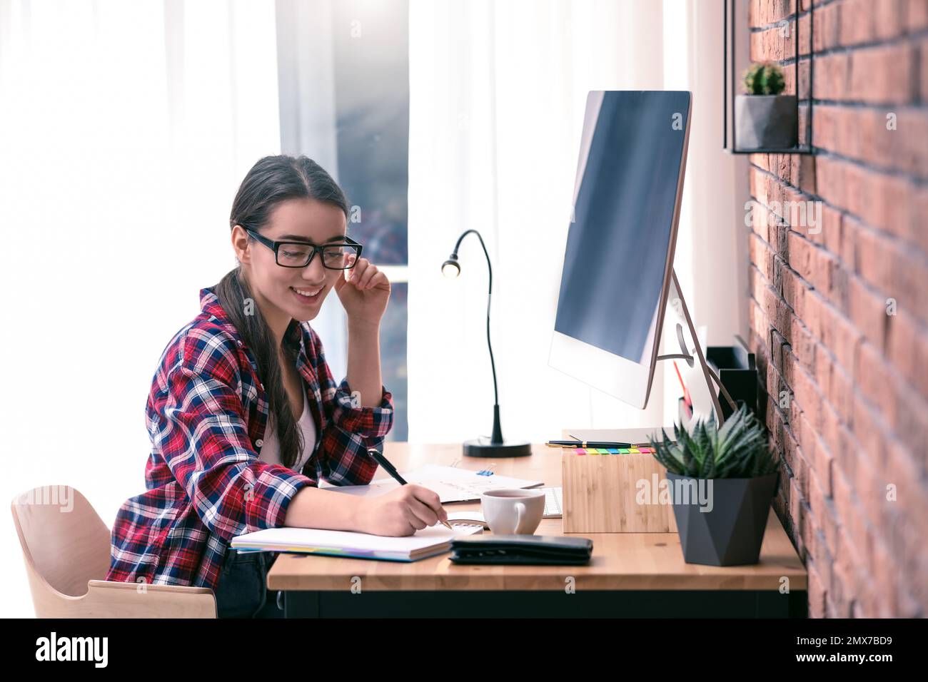 Professional journalist working with computer in office Stock Photo - Alamy