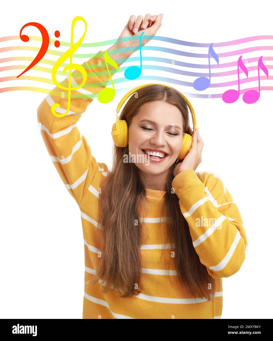 Young woman listening to music with headphones on white background ...