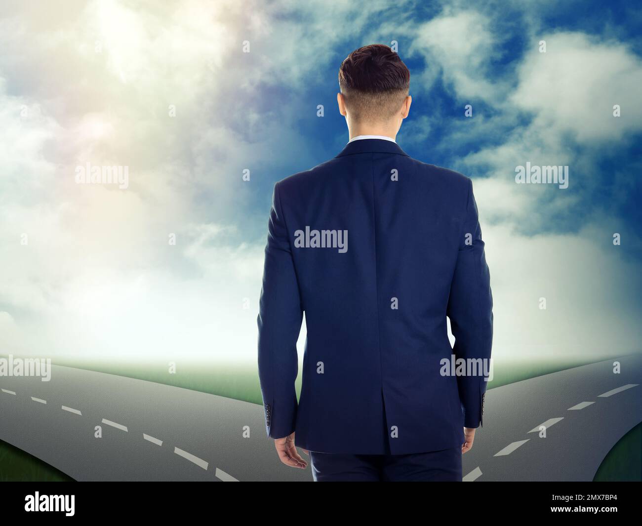 Choose your way. Man standing at crossroads taking important decision ...