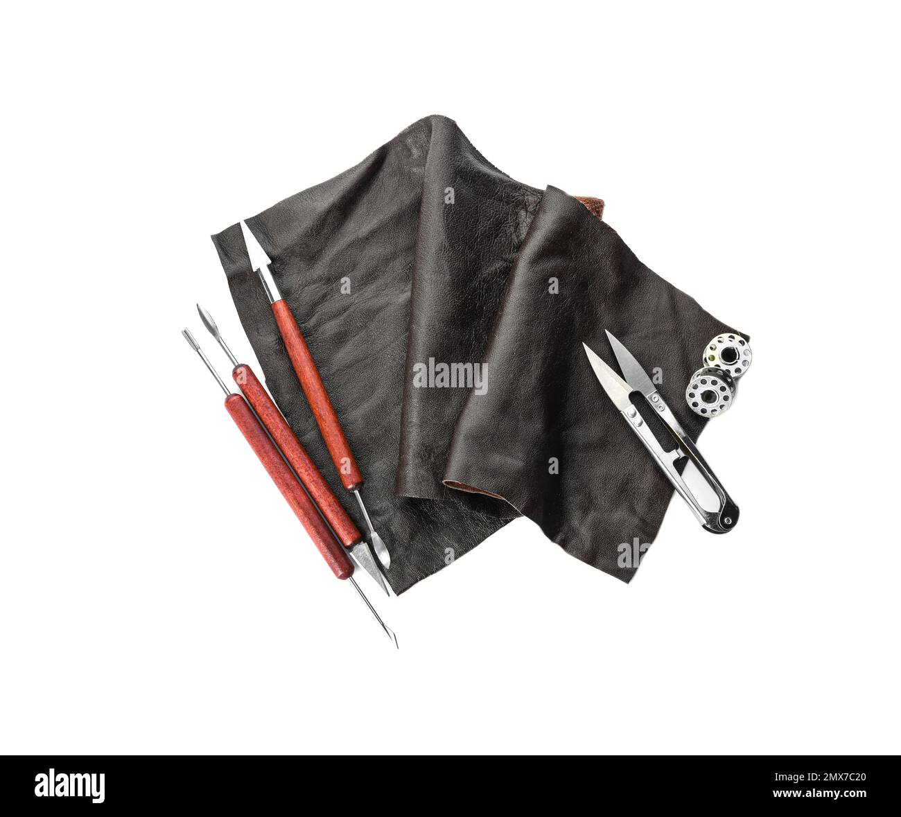 Leather sample and craftsman tools isolated on white, top view Stock ...