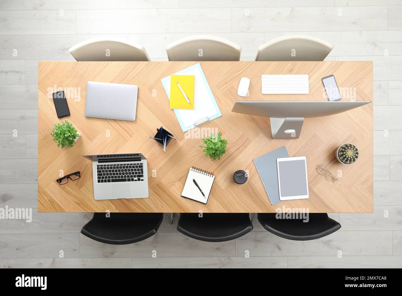 Modern office table with devices and chairs, top view Stock Photo - Alamy