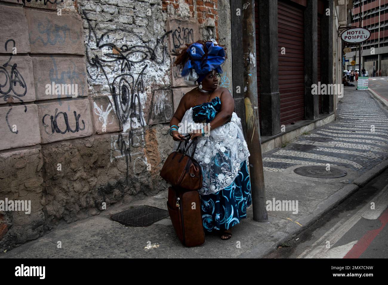 A devotee of the sea goddess Yemanja arrives to participate in an Afro ...