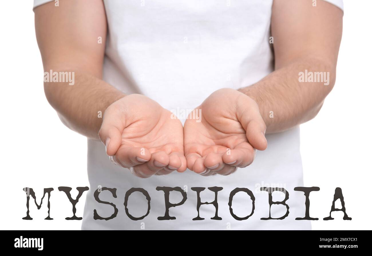 Man with clean hands on white background, closeup. Mysophobia Stock ...