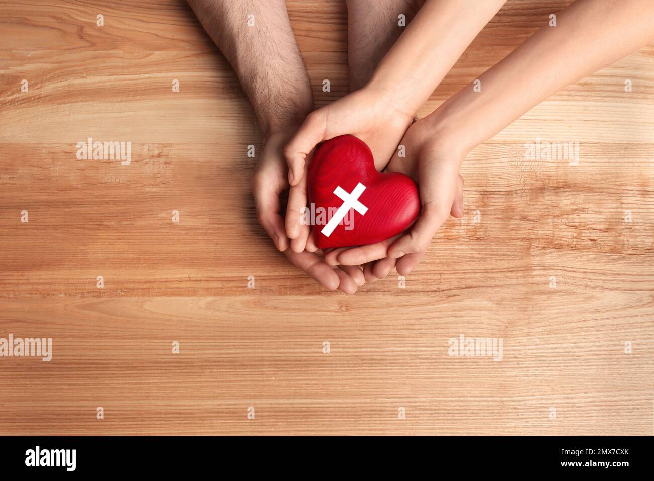 Jesus christ holding heart shape hi-res stock photography and images ...