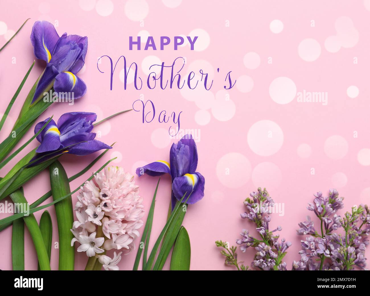 Flat lay composition with beautiful spring flowers and phrase HAPPY ...