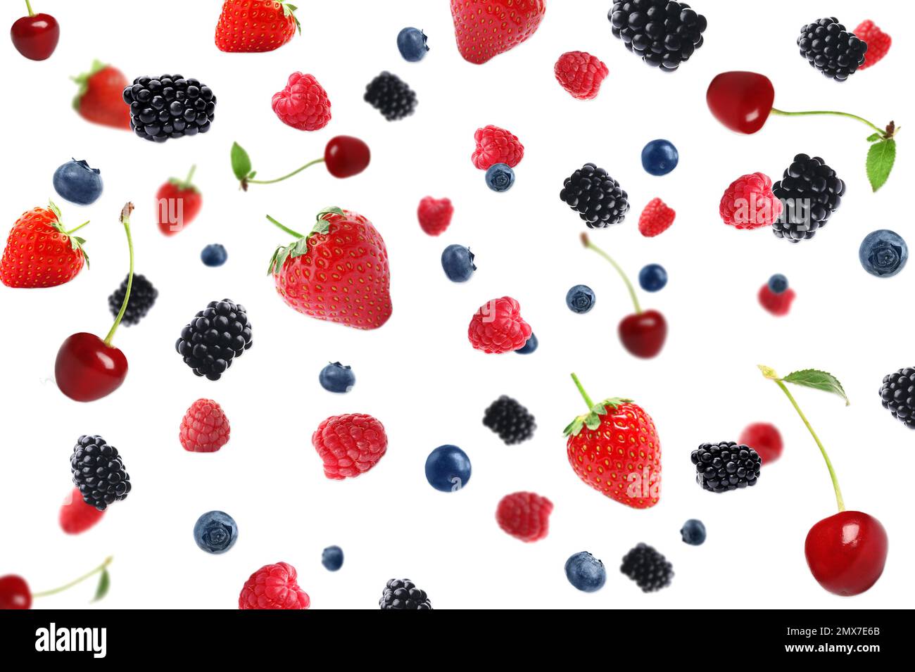 Set of falling sweet berries on white background Stock Photo - Alamy