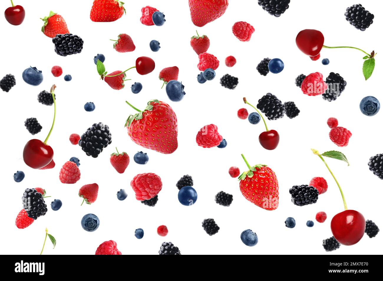 Set of falling sweet berries on white background Stock Photo - Alamy