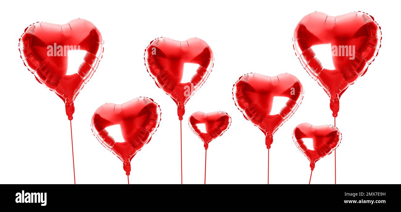 Set of red foil heart shaped balloons on white background Stock Photo ...