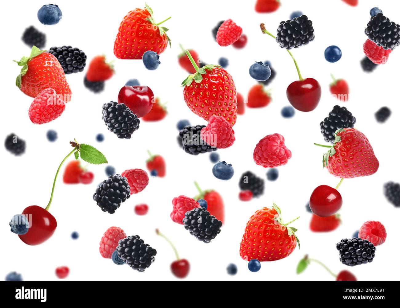 Set of falling sweet berries on white background Stock Photo - Alamy
