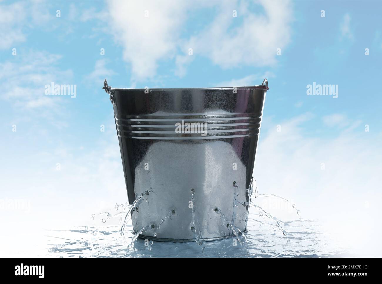 Leaky bucket with water against blue sky Stock Photo - Alamy