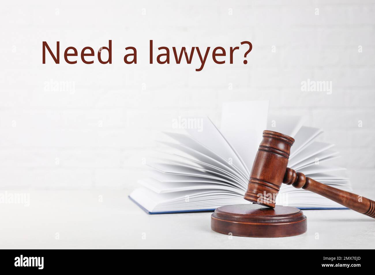 Judge gavel, book and text NEED A LAWYER? on white background Stock ...
