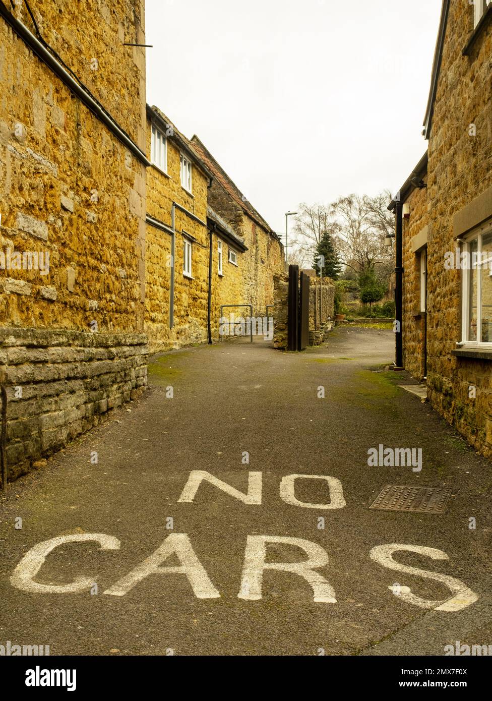 February 2023 - No Cars sign painted on the road in Castle Cary ...