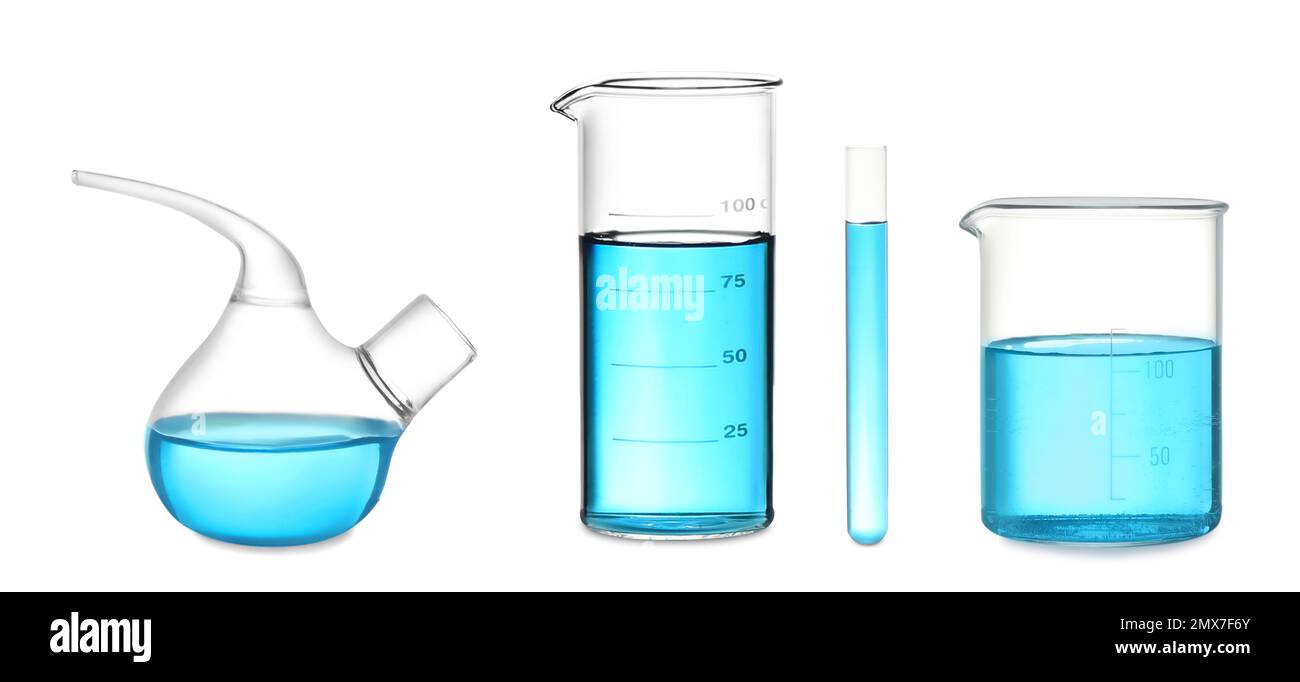 Set of laboratory glassware with blue liquid on white background ...
