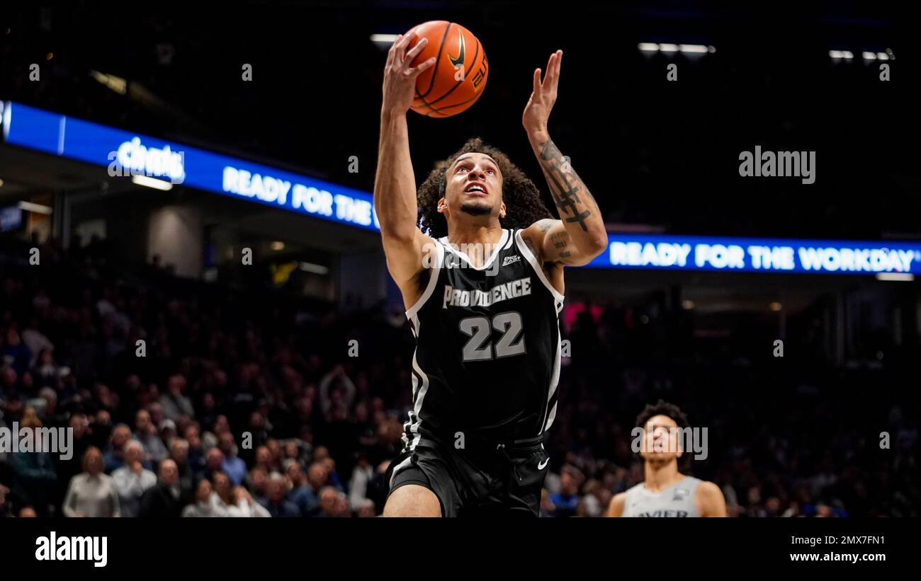 Providence guard Devin Carter (22) dunks during the second half of an ...