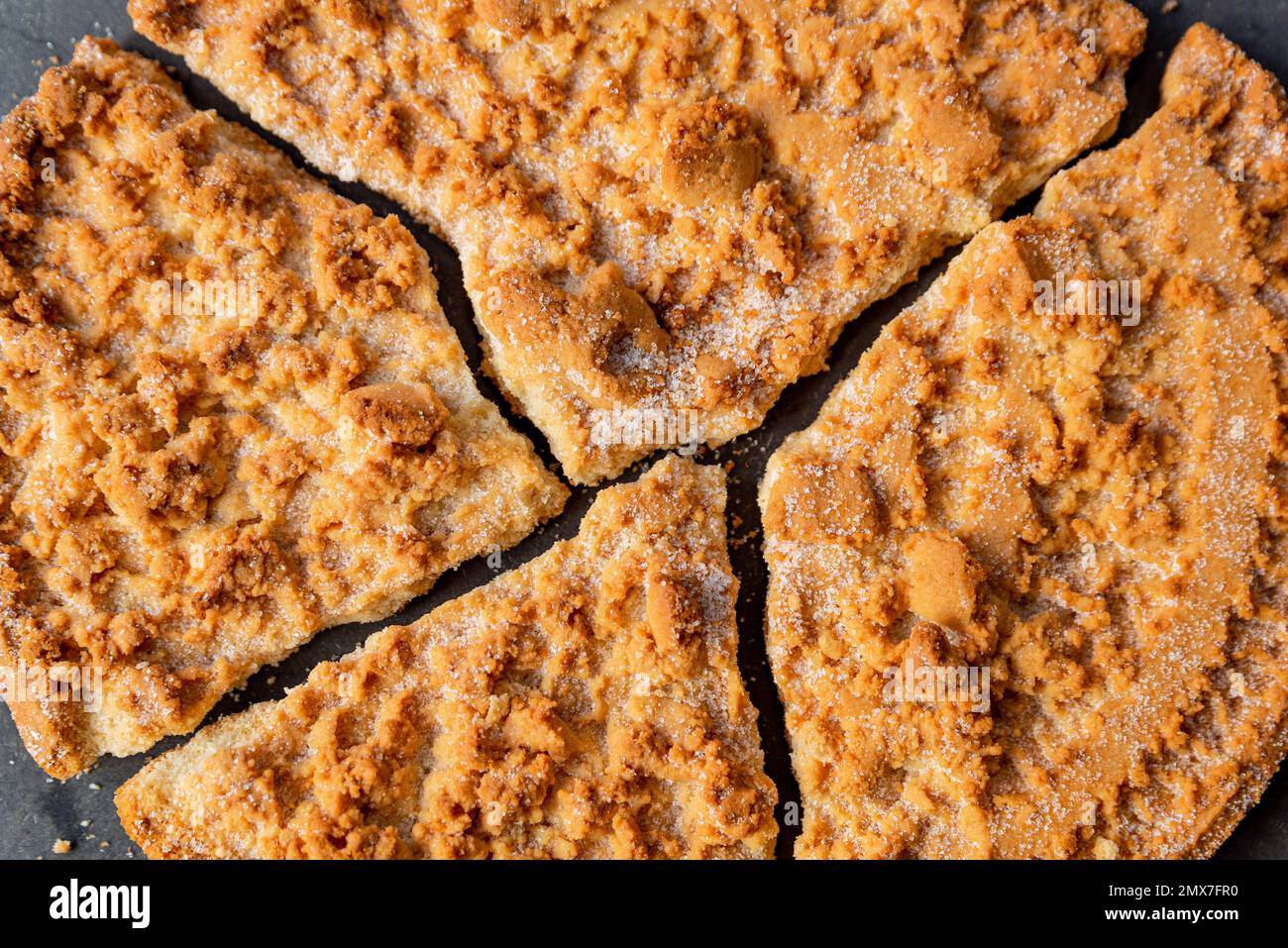 Fregolotta, a traditional italian crumb cake or pie is seen from top on ...