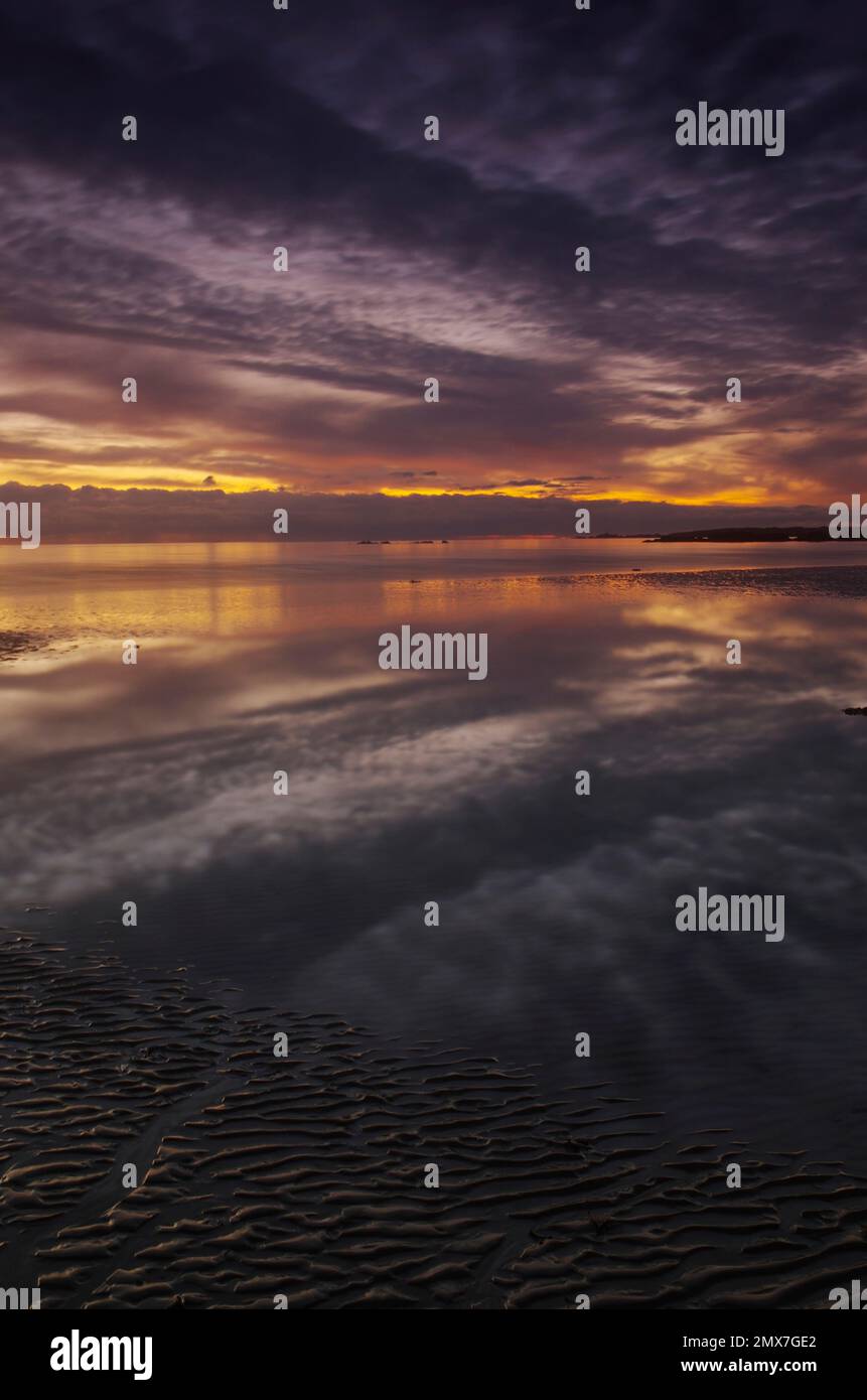 Sunset at Cymyran Beach, Anglesey, North Wales, United Kingdom Stock ...