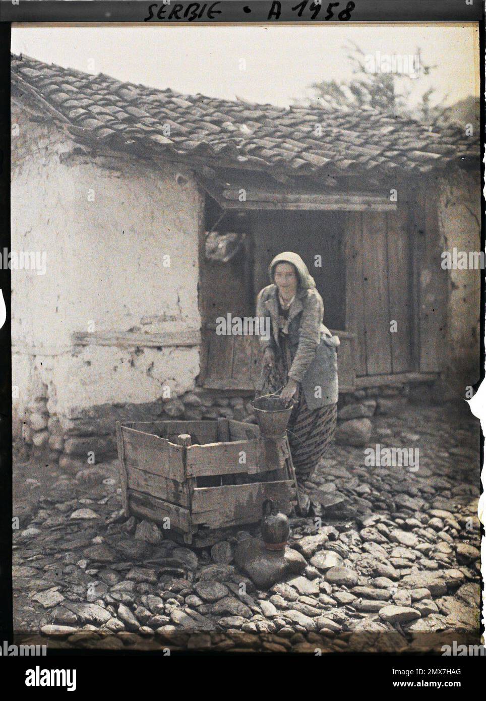 Prizren, Kosovo, Serbia woman from the Tzigane community at the well ...