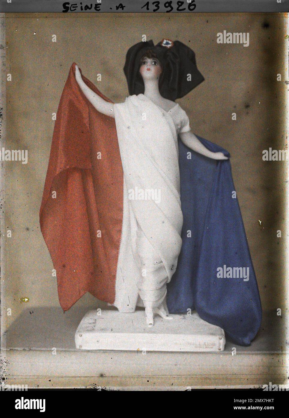 Paris, France Patriotic doll with the effigy of Alsace Stock Photo - Alamy