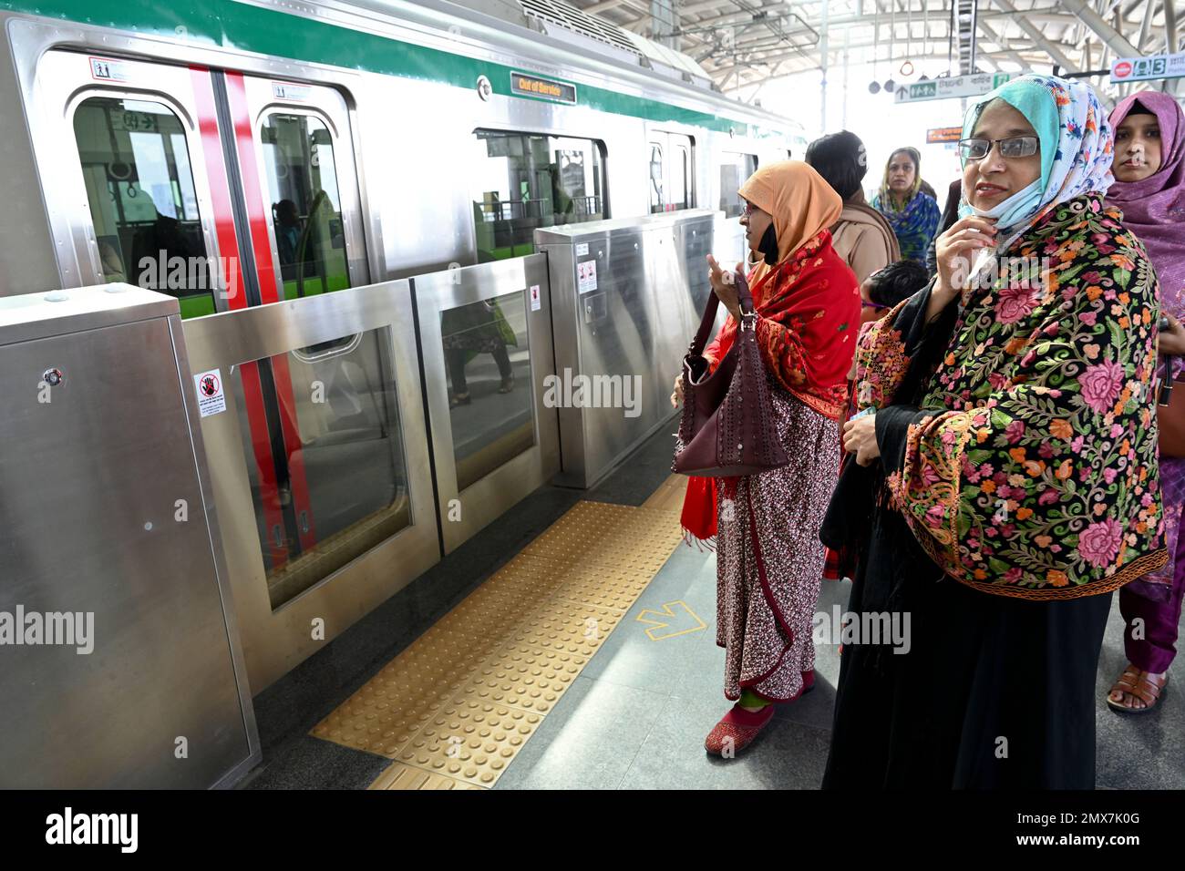 Dhaka, Bangladesh, on February 2, 2023 Passengers wait for metro rail ...