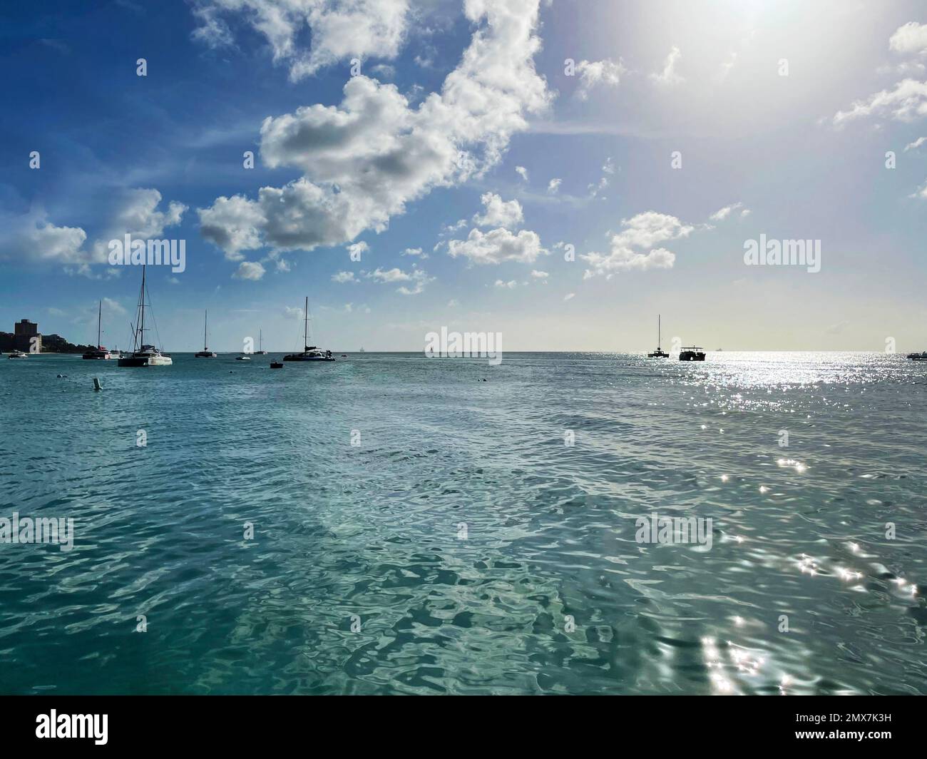 Boats on the Caribbean sea, off the coast of Aruba Stock Photo - Alamy