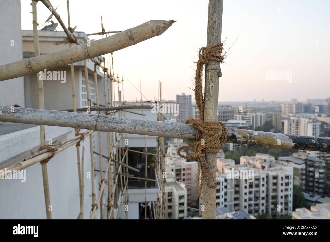 INDIA, Mumbai, apartment tower under renovation, Scaffolding with ...