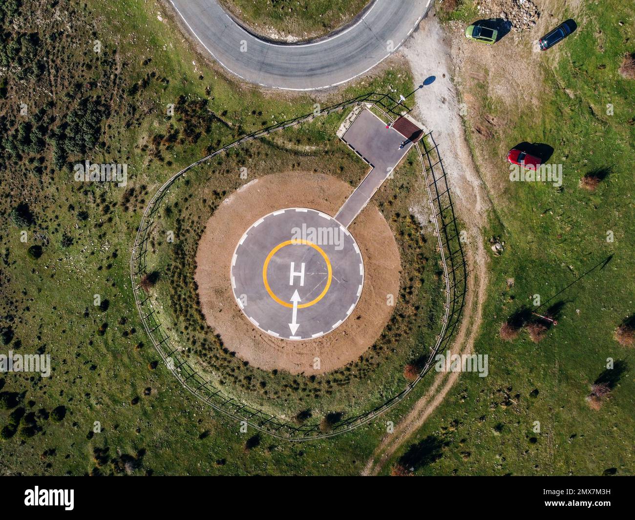 Aerial view of winding road. Splendid morning scene of asphalt roadway ...