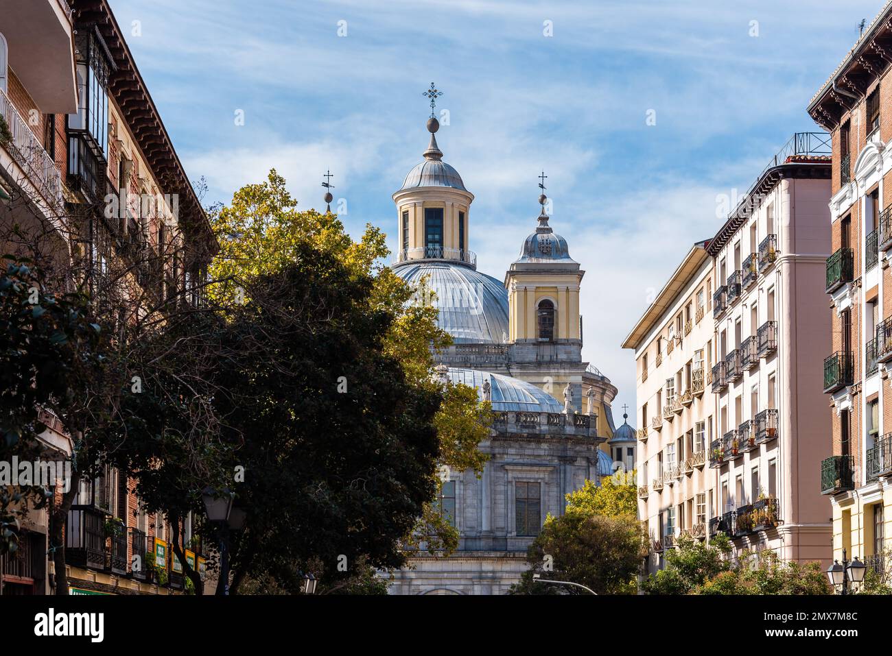 Street in historic center of Madrid, lined with colorful residential ...