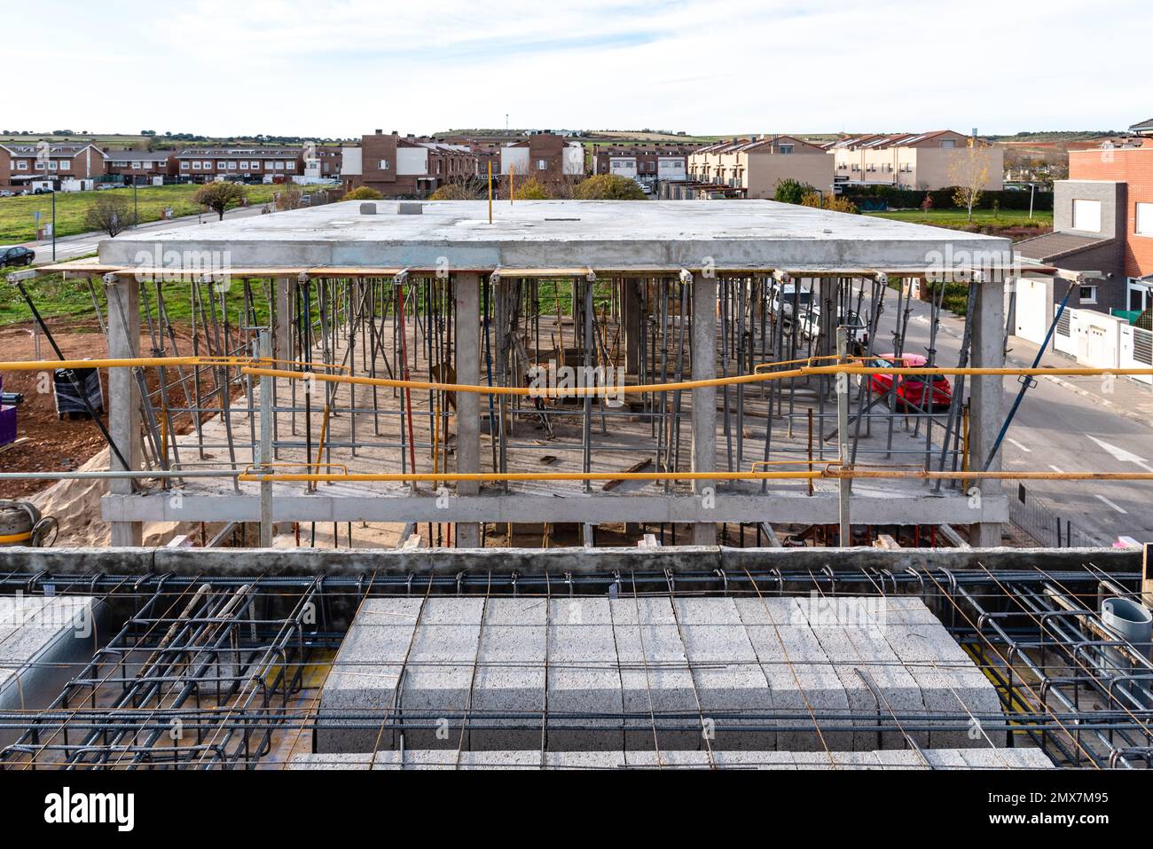 Construction site with steel formworks and reinforcing bars for pillars ...