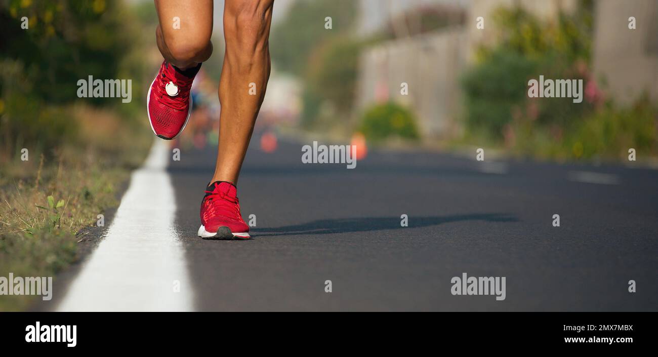 Man running on street asphalt hi-res stock photography and images - Alamy