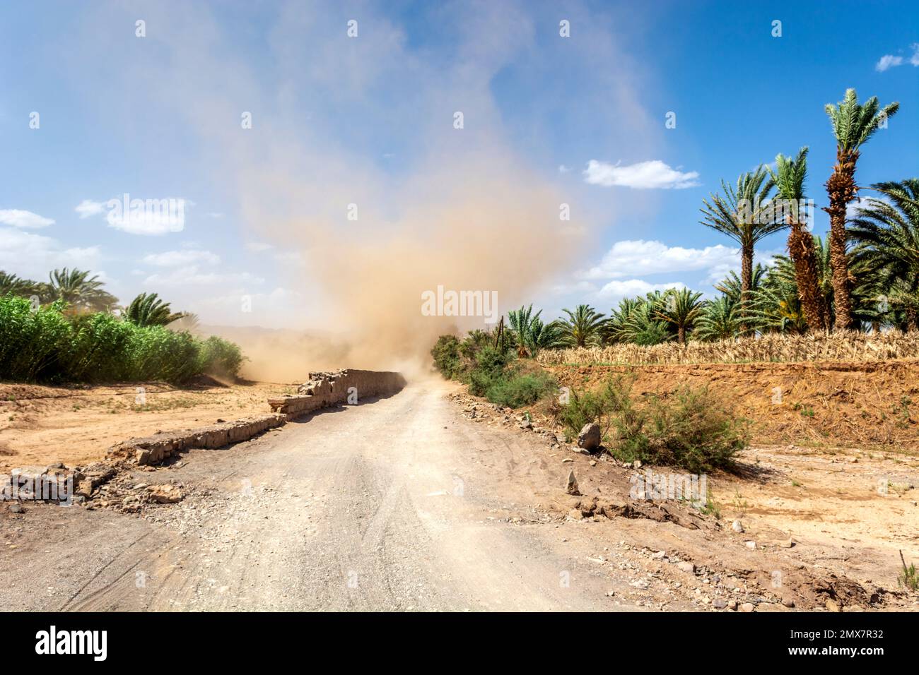 Dust tornado at the edge of a track in southern Morocco. Agdz, Zagora ...