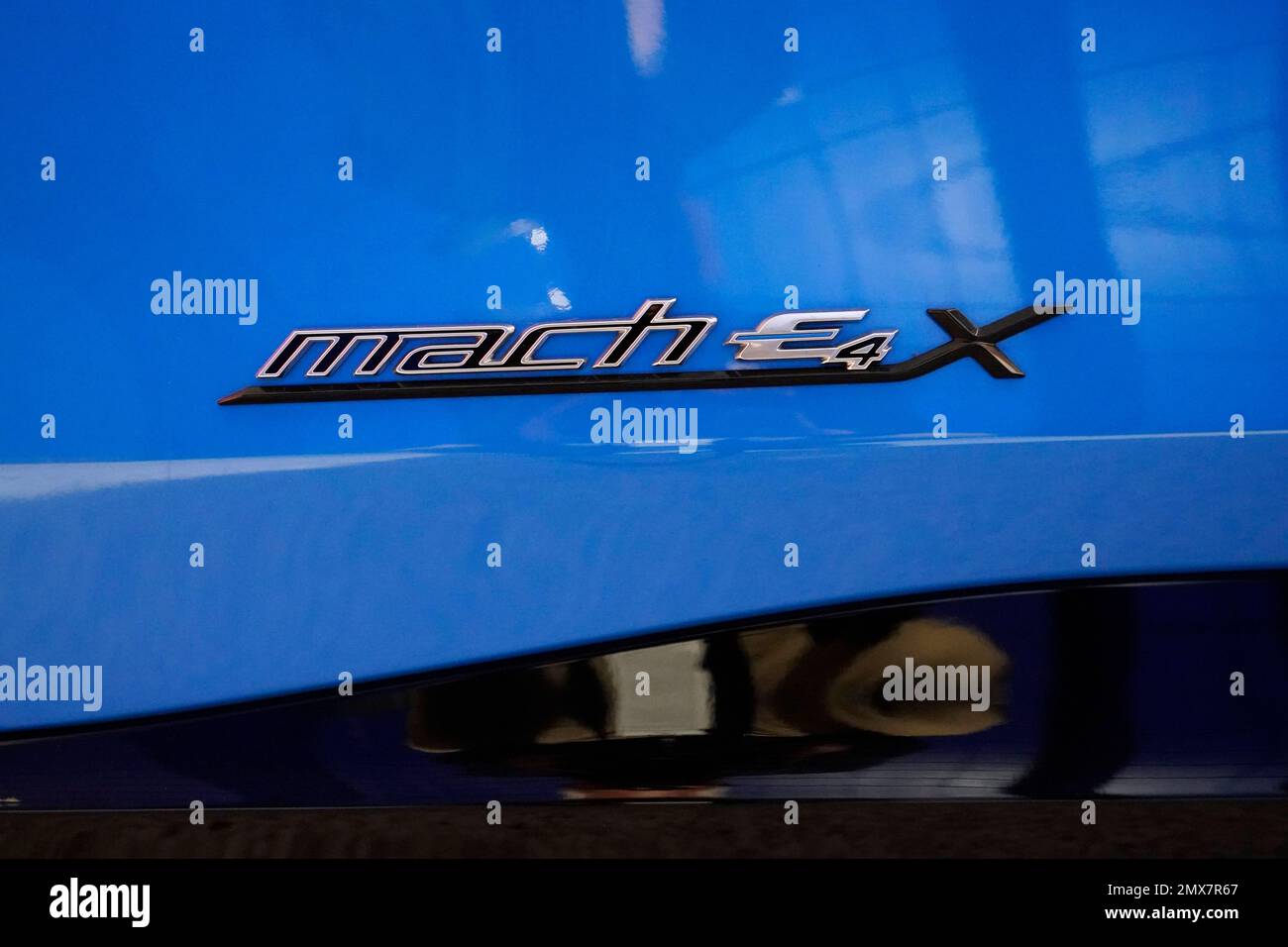 The name badge of an electric Ford Mustang Mach-E 4X is shown as the ...